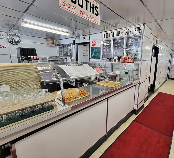 Serve Yourself isn't just a sign—it's a philosophy. This counter has been the stage for more food joy than most five-star restaurants. 