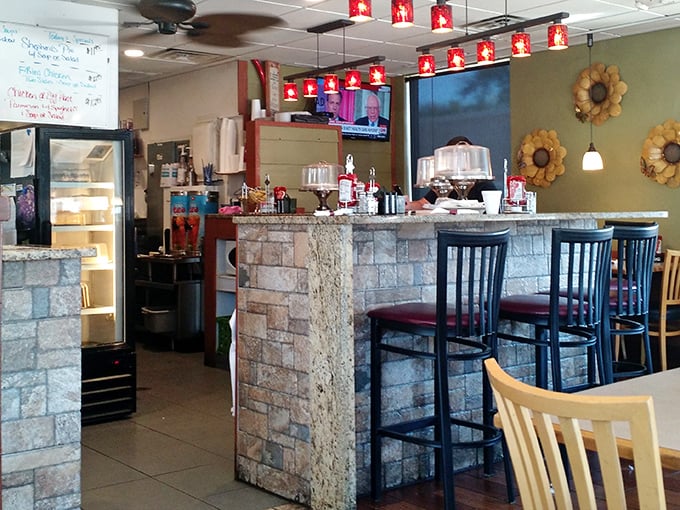 The stone-faced counter and cozy booths create that perfect diner atmosphere—casual enough for jeans, comfortable enough to linger over that second coffee.