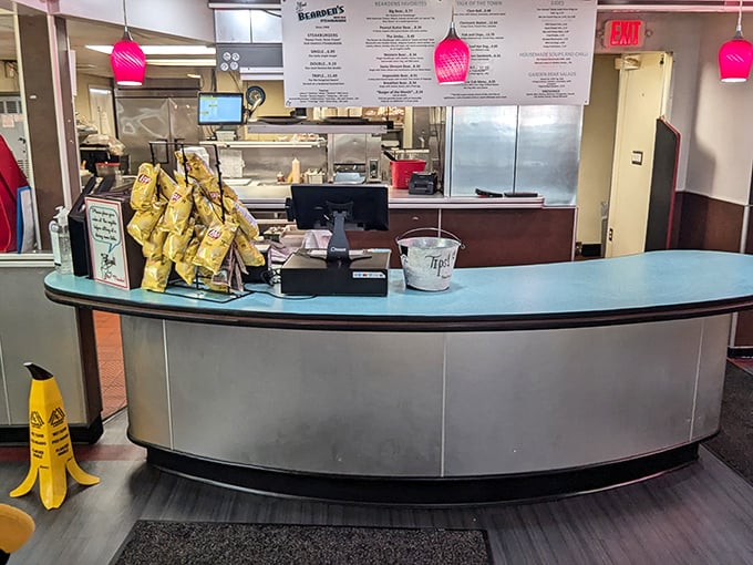 The command center of comfort food operations – where orders are called, magic happens, and banana chips stand at attention.