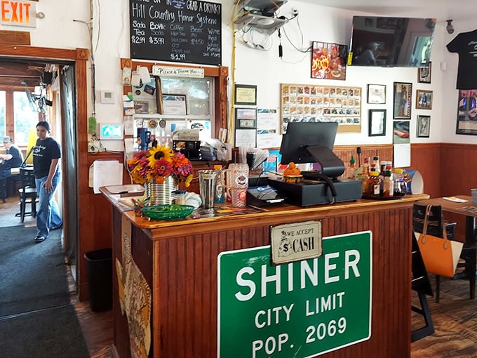 The counter where dreams come true and orders are placed. Notice the sunflowers—nature's way of saying "Howdy" in the most Texas way possible.
