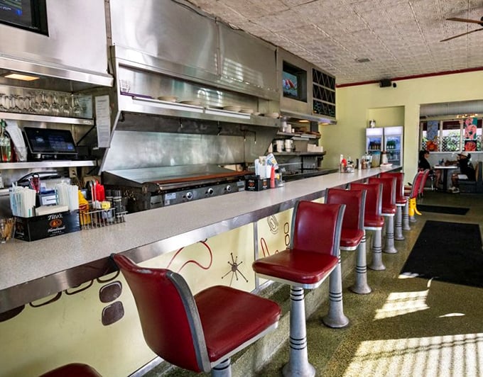 The counter—where solo diners become regulars and the kitchen ballet unfolds before your eyes. Prime seating for both people-watching and plate-watching.