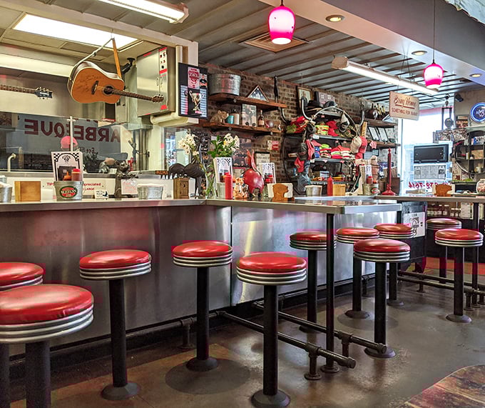 The counter where barbecue dreams come true. Those pink pendant lights add a touch of whimsy to this temple of smoked meat.