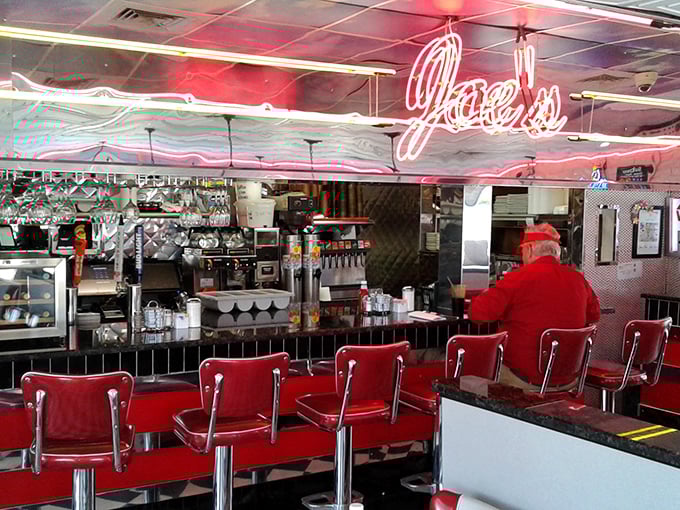 The counter seats – where solo diners become temporary family and the coffee refills flow with telepathic precision.