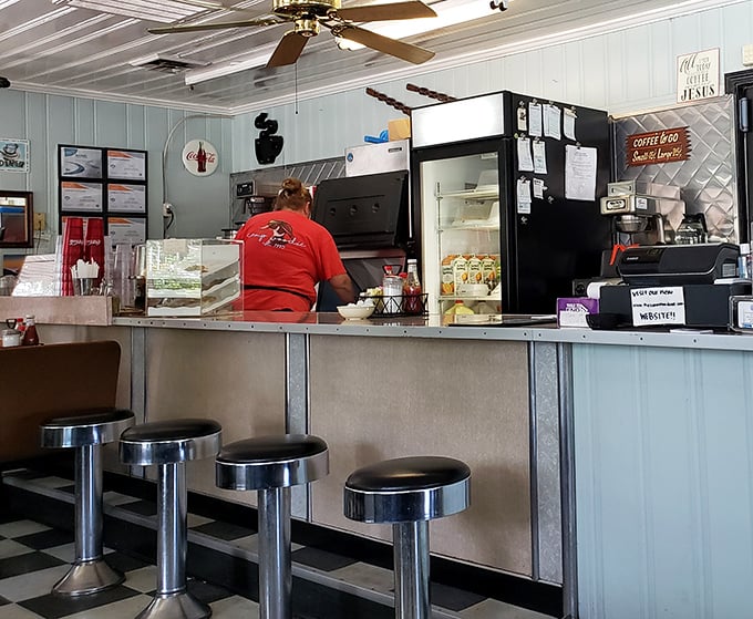 Classic counter seating where solo diners become regulars and the staff remembers not just your order, but your life story.