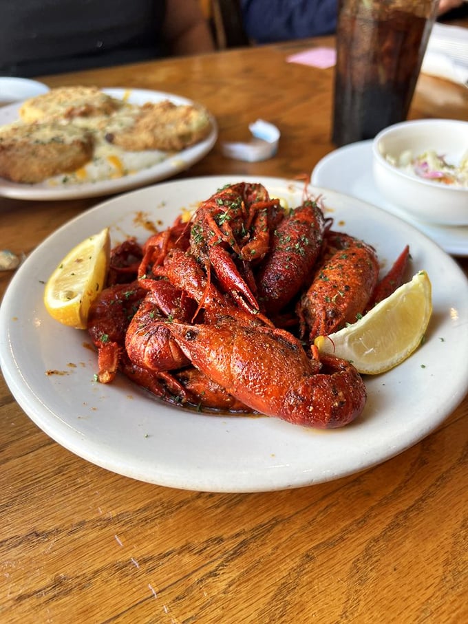 Bright red crawfish seasoned to perfection, arranged like tasty little soldiers waiting to be drafted into your happy stomach.