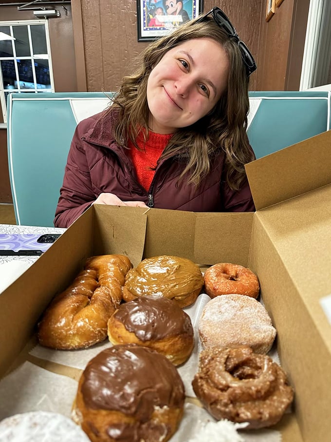 The universal expression of donut joy – that moment when you open the box and realize all your life choices have led to this perfect moment.