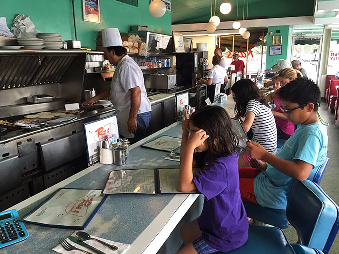 Where kids learn the sacred ritual of diner breakfast—watching short-order magic happen right before their wide eyes.