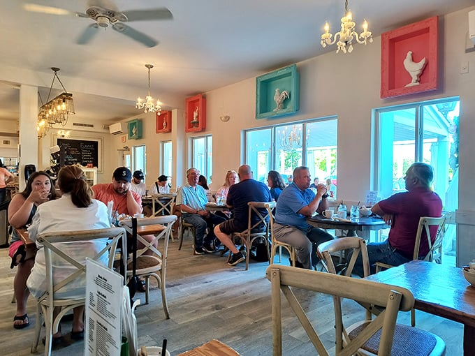 Happy diners sharing stories over steaming plates – this is what breakfast community looks like in action.