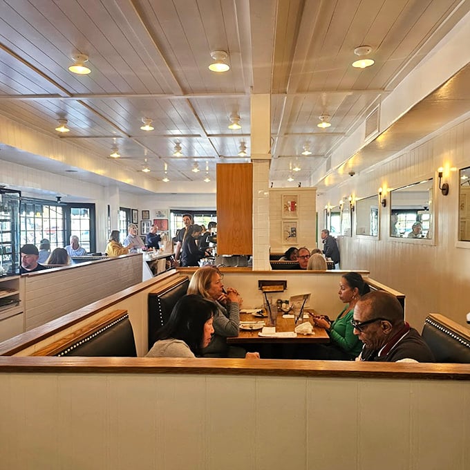 The dining room hums with the universal language of satisfaction – forks meeting plates and conversations punctuated by appreciative nods.