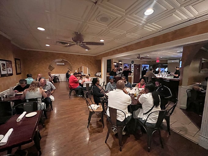Where strangers become friends over shared pasta experiences. The dining room hums with the symphony of satisfaction and clinking glasses.