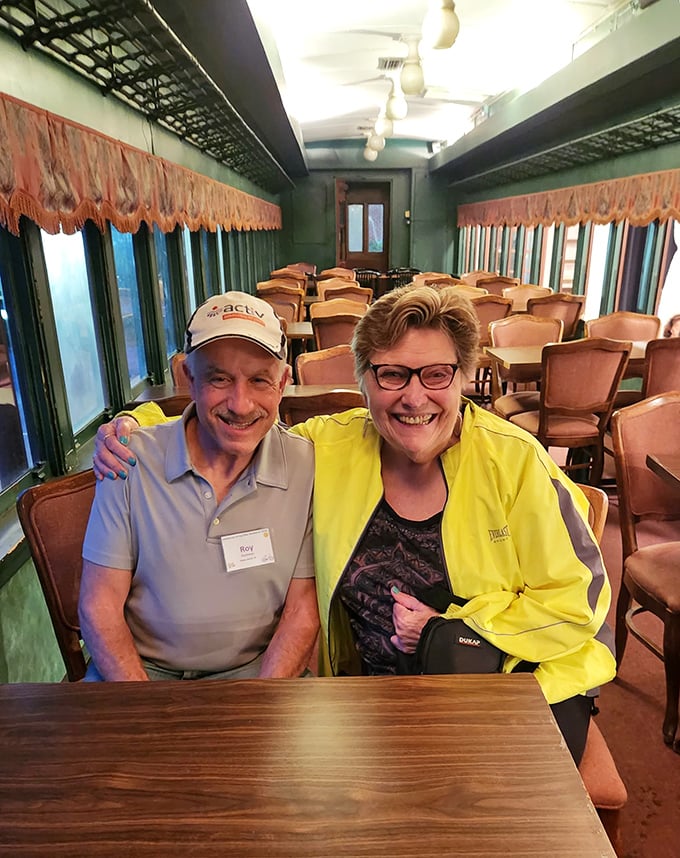 Happy diners enjoying the authentic railroad car experience. Some meals are about more than food—they're about creating memories in extraordinary settings.