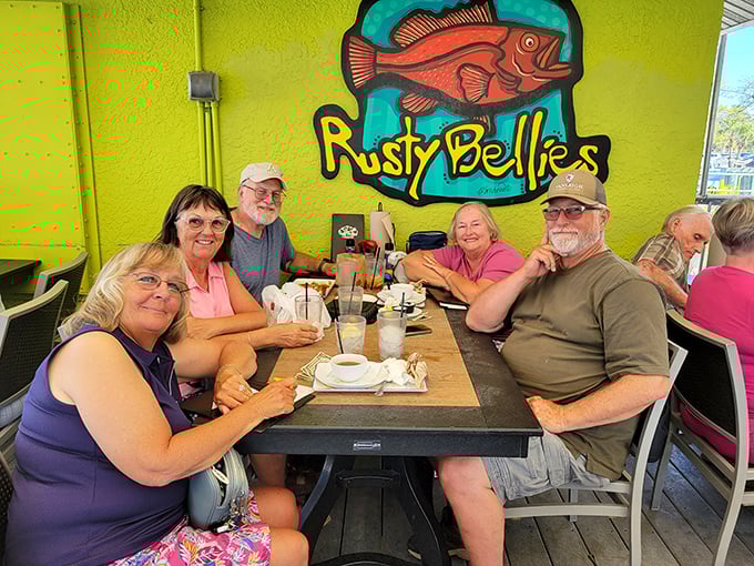 Happy diners proving that the best tables don't need white tablecloths, just great food and company.