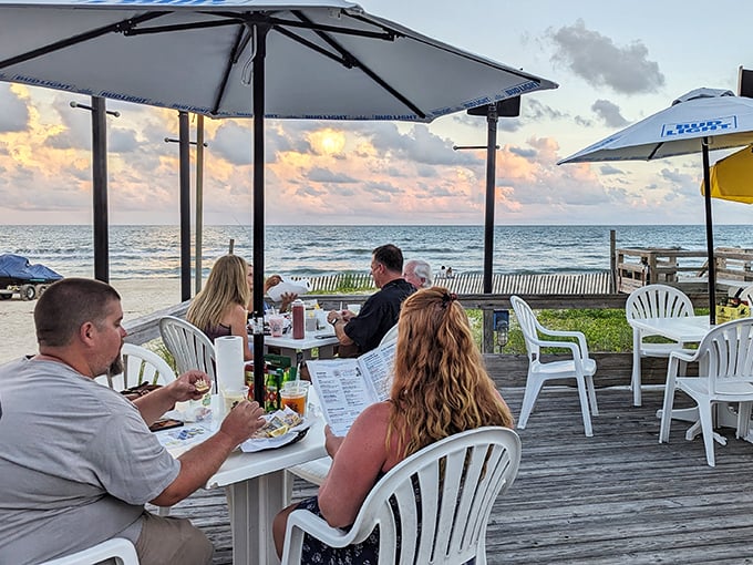 Sunset dining with your toes practically in the sand – where the ocean view competes with the seafood for your attention and everyone wins.