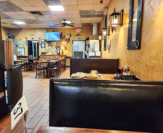 Those black leather booths have supported generations of happy diners, silent witnesses to countless celebrations, first dates, and regular Tuesday dinners.