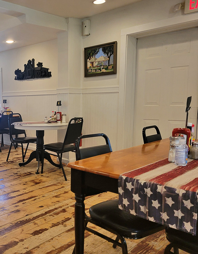 Simple tables, patriotic touches, and walls that could tell stories—this is where food trumps frills every single time.