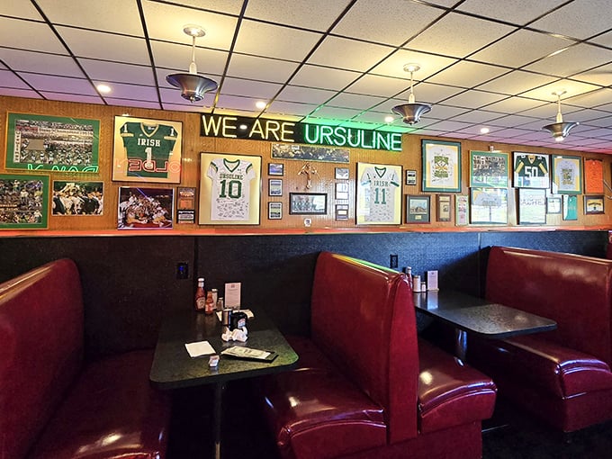 Sports memorabilia and comfort – where Ursuline pride meets perfectly positioned booths for game-day gatherings.