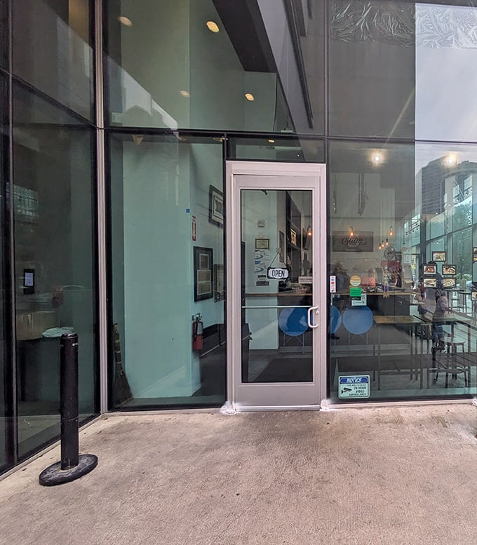 The entrance beckons like a portal to flavor country – clean lines and glass doors promising a cheesesteak experience unlike any other in Philly.