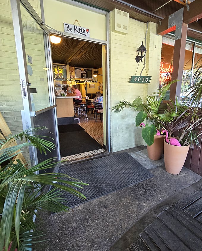 "Be Kind" reads the sign above the entrance—a gentle reminder before you enter this temple of comfort food.