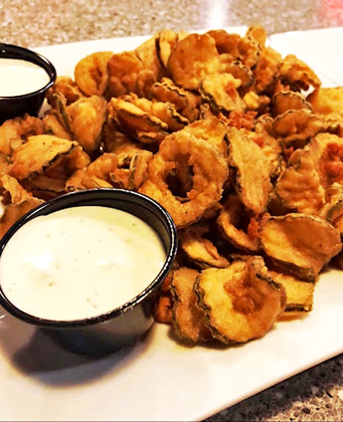 Fried pickles—those tangy, crunchy little discs of joy—prove that anything becomes magical when battered and introduced to hot oil.