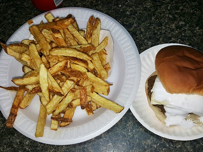 Golden fries and a perfectly humble burger—the dynamic duo of comfort food that never disappoints. No cape required.
