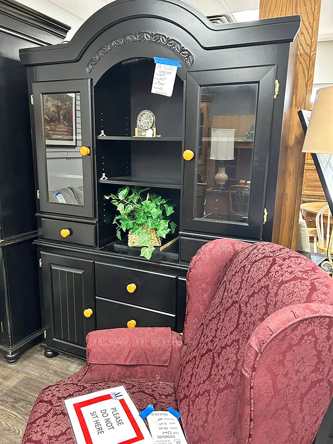 Living room sets staged so perfectly you might forget you're in a thrift store paradise.