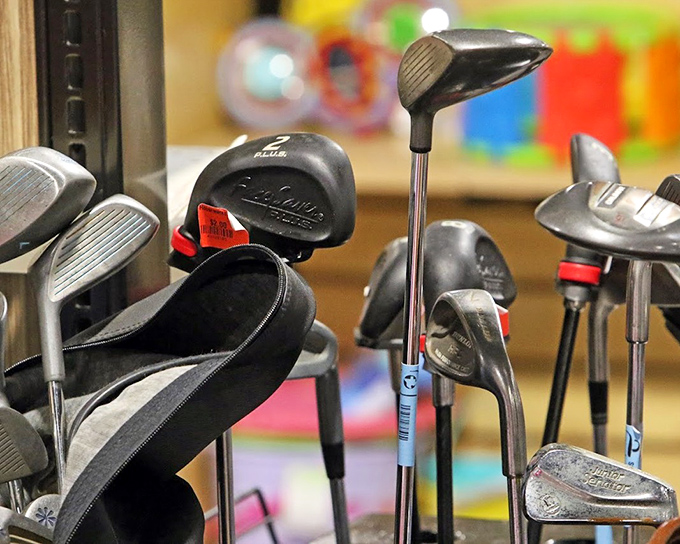 Golf clubs patiently waiting for their second act—because why pay country club prices when you can get the same swing for pocket change?