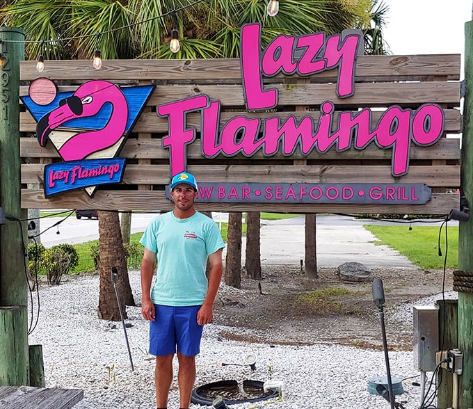 The sign says it all—a pink flamingo with attitude welcomes you to this beloved Fort Myers institution.