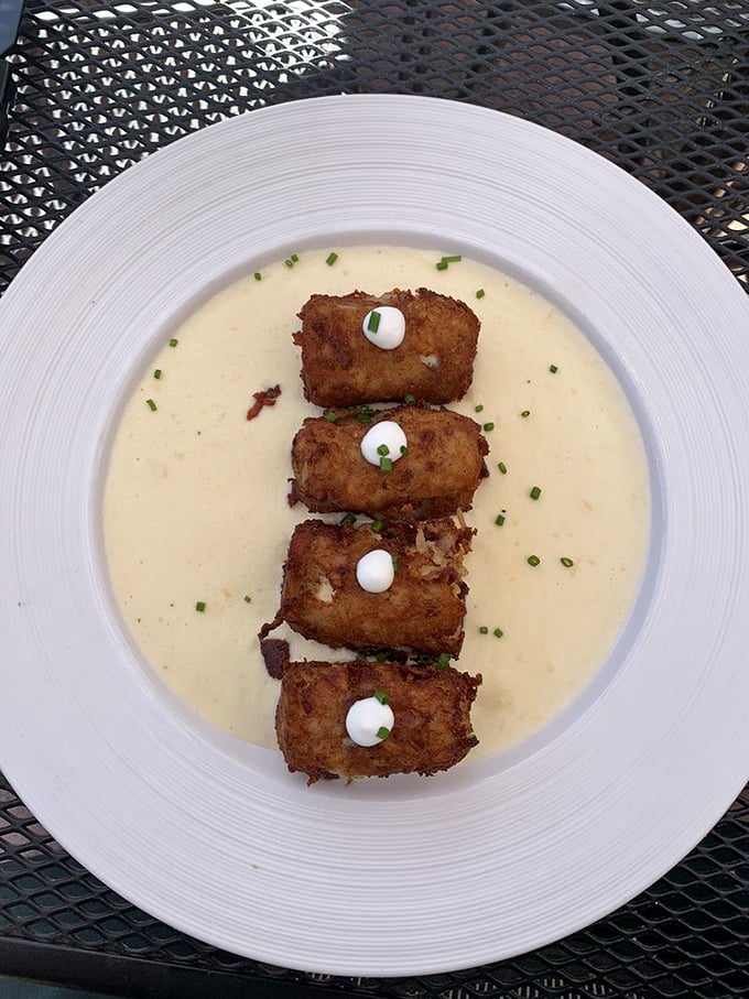 These golden nuggets floating in creamy sauce aren't just appetizers—they're conversation stoppers. Words become unnecessary when food is this good.