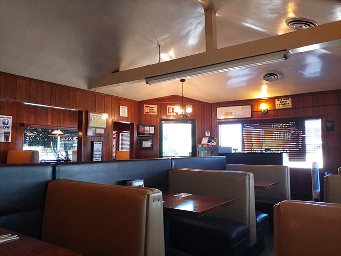The interior feels like a time capsule from when conversation mattered more than Wi-Fi passwords and meat was the main event.
