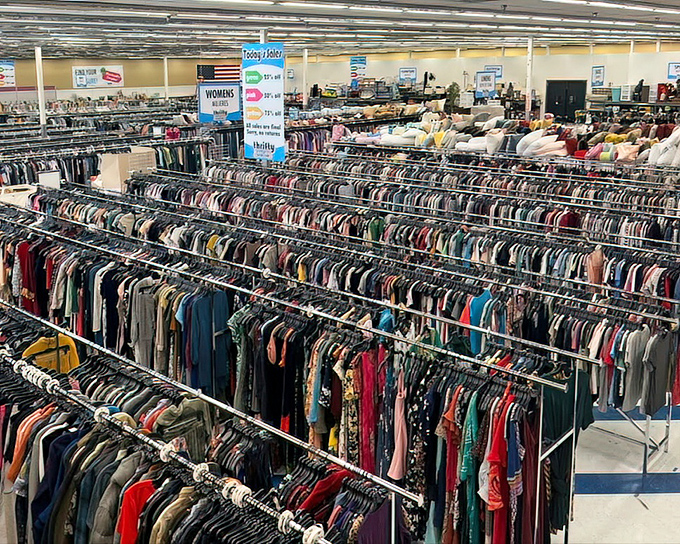 The clothing section from above looks like a textile library—rows upon rows of fashion history waiting to be checked out.
