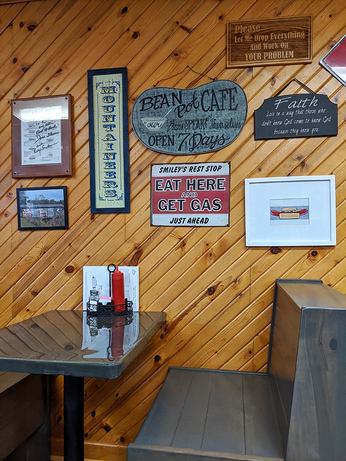 The wood-paneled walls tell stories of local history through an eclectic collection of signs – each one a conversation starter for first-time visitors.