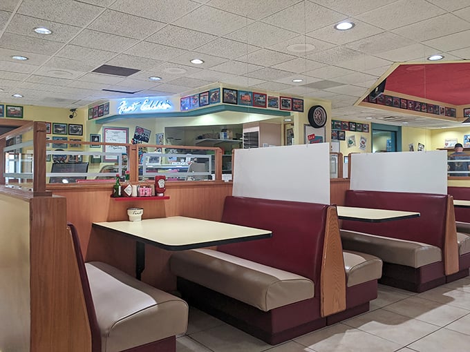 Classic diner booths in burgundy and beige—where countless conversations, first dates, and "remember when" moments have unfolded over decades of pancakes.