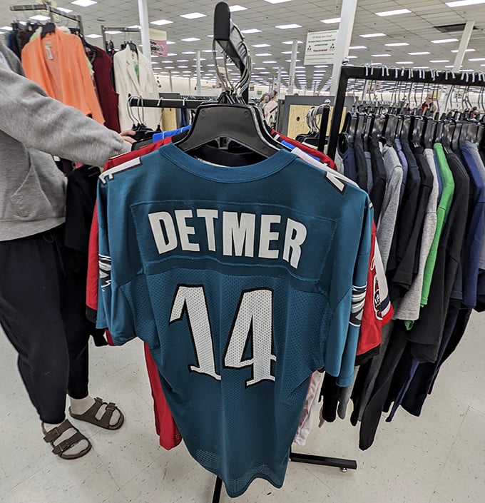 A Detmer jersey among the racks – because one person's closet cleanout is another's game day treasure.