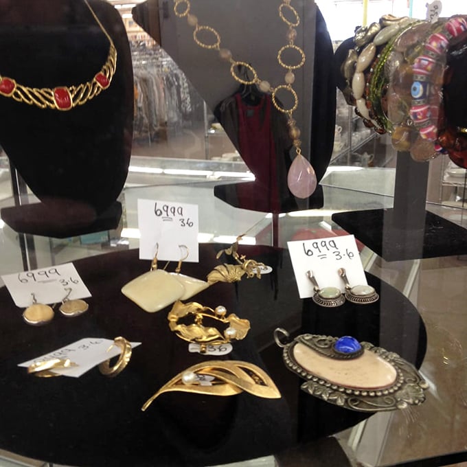 The jewelry counter sparkles with possibility—costume pieces and occasional hidden gems that make you feel like you've pulled off the perfect heist.