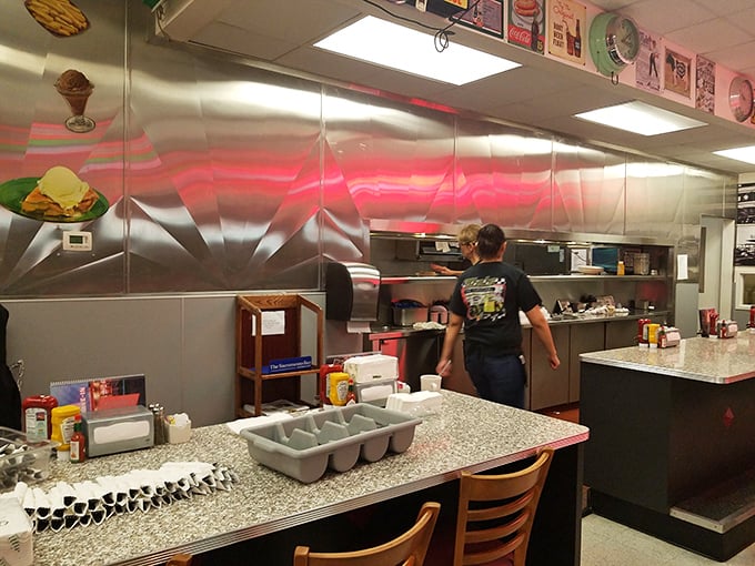 Where the magic happens—Mels' kitchen gleams with stainless steel efficiency, ready to turn out plate after plate of diner perfection.