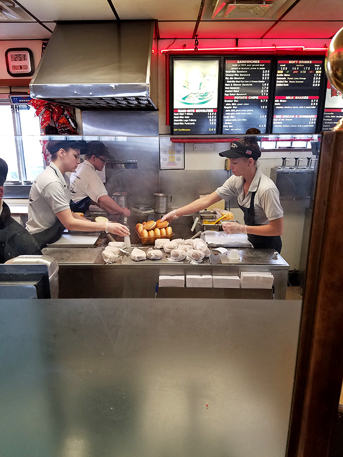 Behind the scenes where the magic happens—young hands continuing traditions that have satisfied Ohioans for generations.