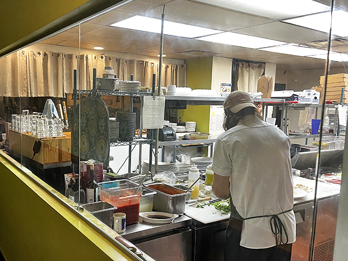 A glimpse into the kitchen where the magic happens—no fancy pyrotechnics, just skilled hands creating dishes that taste like memories.