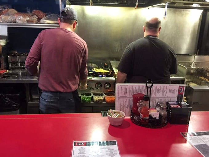The kitchen ballet—where breakfast dreams are choreographed on a well-seasoned grill by cooks who understand the sacred responsibility of the first meal of the day. 