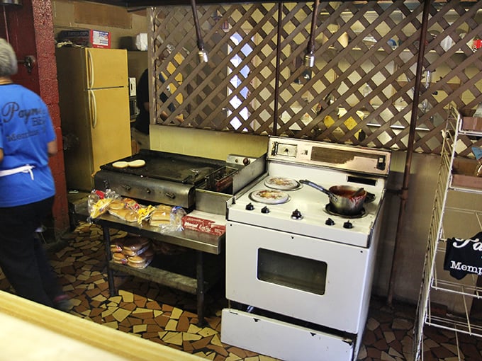 No stainless steel wonderland here—just well-worn equipment that's seen more barbecue triumphs than most of us have had hot meals.