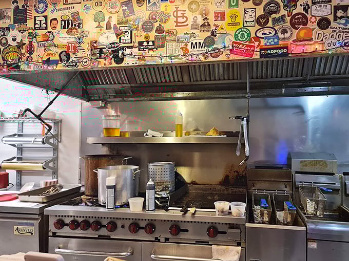 Behind every great seafood joint is a kitchen with character – this one's ceiling of stickers tells stories of decades of satisfied diners.