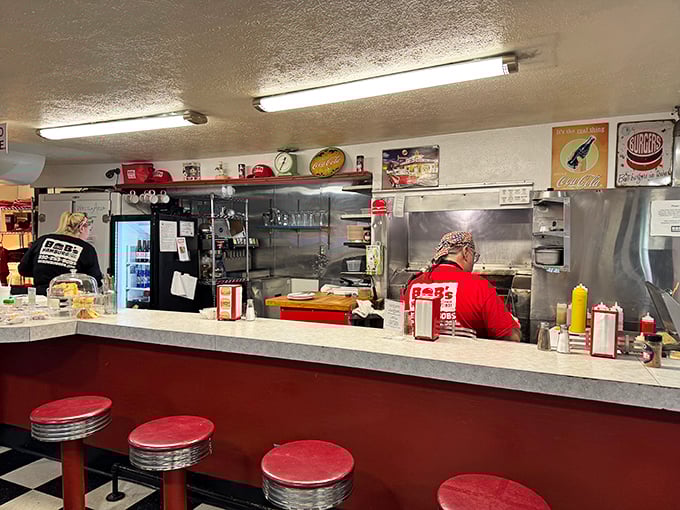 The open kitchen isn't for show—it's a stage where burger artisans perform their craft with the confidence of Broadway veterans.