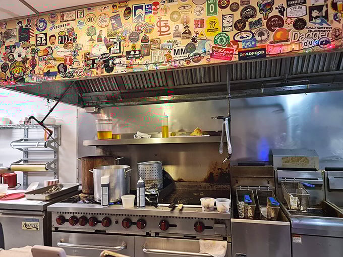 Behind every great seafood joint is a kitchen with character – where stickers tell stories and every pot holds decades of culinary wisdom.