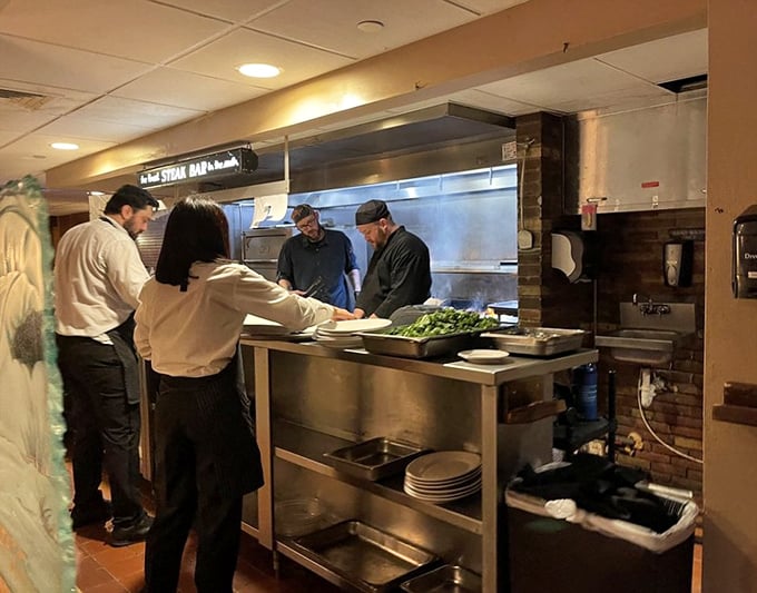 The kitchen ballet—where timing is everything and plates emerge with the precision of a Swiss watch factory.
