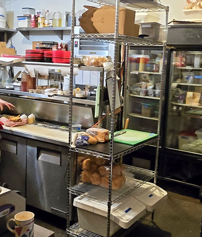 A glimpse into the kitchen reveals the organized chaos where burger magic happens—no smoke and mirrors, just good ingredients and care.
