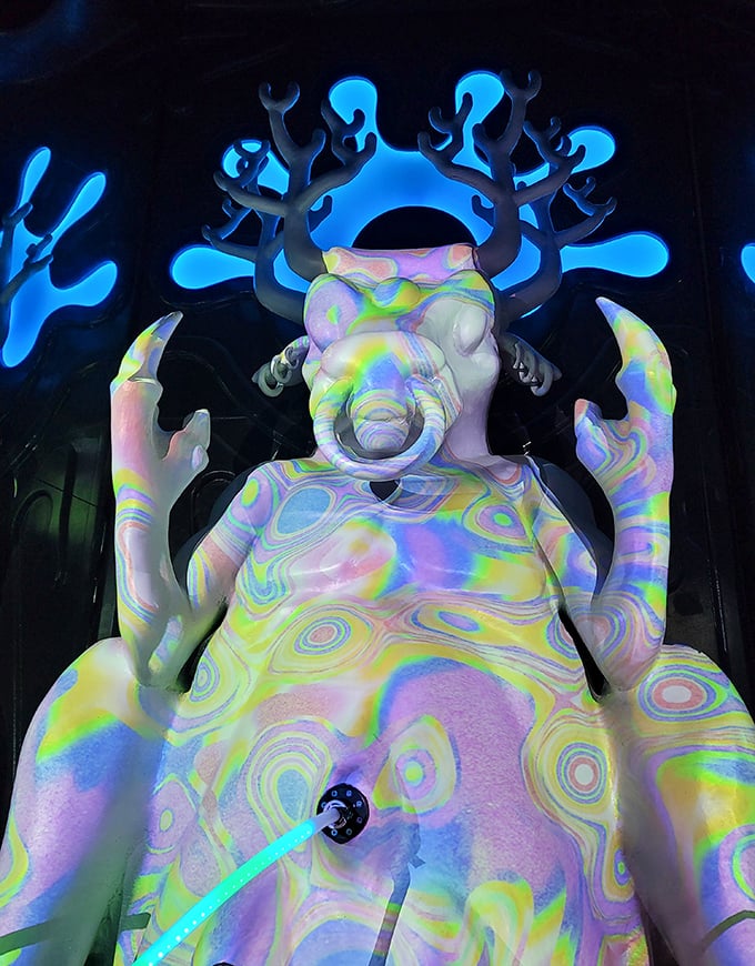 A bioluminescent deity that seems to have escaped from the dreams of a marine biologist with an art degree.