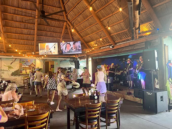 Live music and cold drinks—the universal language of "you should have been here" moments that make vacation memories stick.