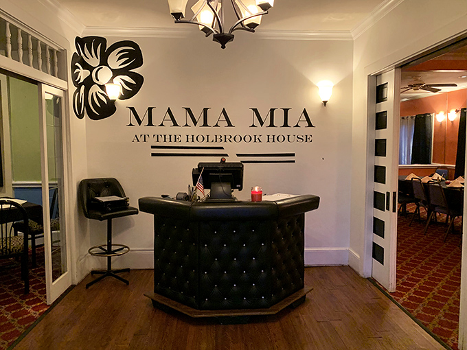 The lobby welcomes guests with "Mama Mia at the Holbrook House" – a name that promises home-style warmth.