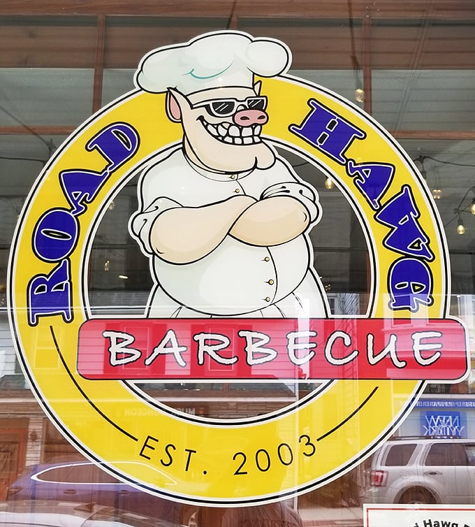 The Road Hawg mascot grins knowingly, like he's in on a delicious secret that you're about to discover for yourself.