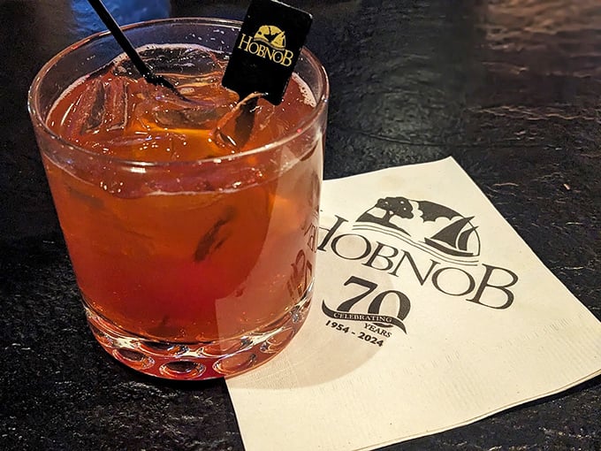 An Old Fashioned worthy of Wisconsin tradition, served with HOBNOB's 70th anniversary napkin—proof that some things improve with age.