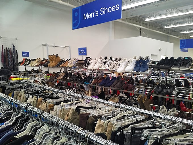 The men's shoe section offers everything from barely-worn dress shoes to broken-in work boots, all waiting for their second act.